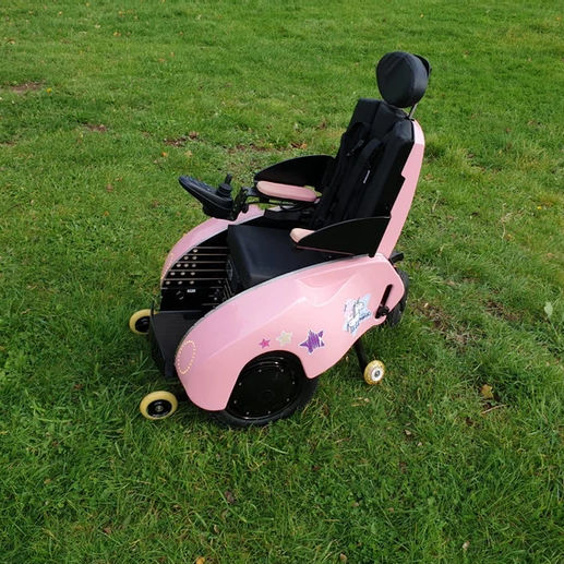 Fauteuil roulant électrique - Tiny Trax - pédiatrique / d'exterieur / avec repose-jambes